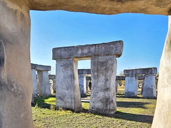 Peering through the stones reveals layers of history reimagined, each archway framing another piece of the puzzle.