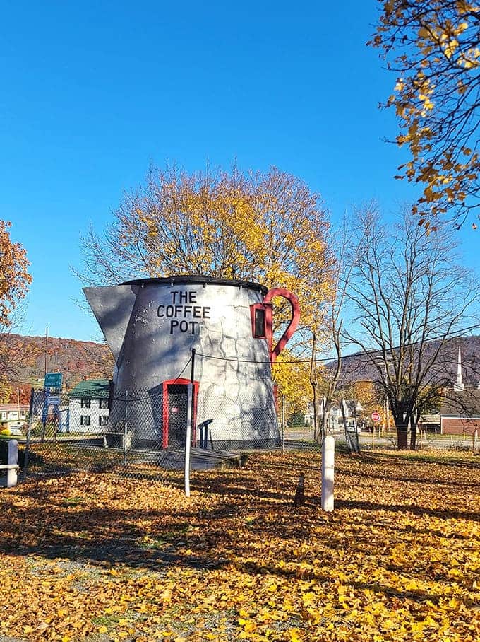 Fall foliage frames this caffeinated monument like nature's own Instagram filter, no app required.