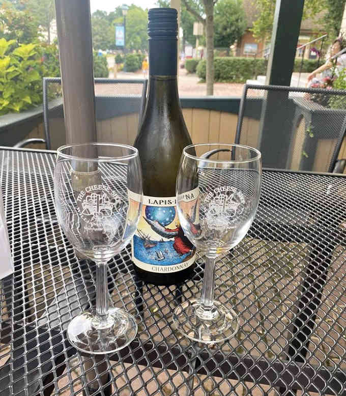 Wine glasses with The Cheese Shop logo, because pairing your sandwich with a good vintage is absolutely encouraged here.