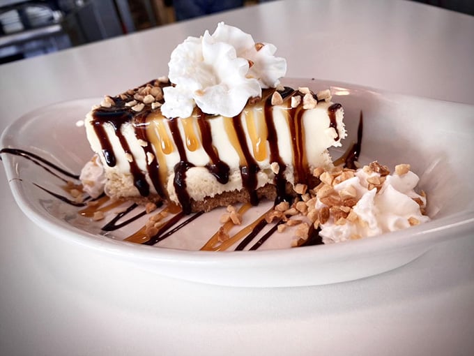 Turtle cheesecake drizzled with caramel and chocolate makes every diet start officially tomorrow, not today, friend.