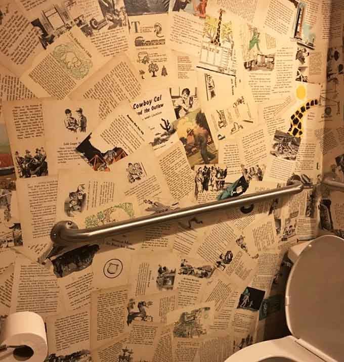 Even the bathroom celebrates literature with vintage book pages covering every inch of wall space available.