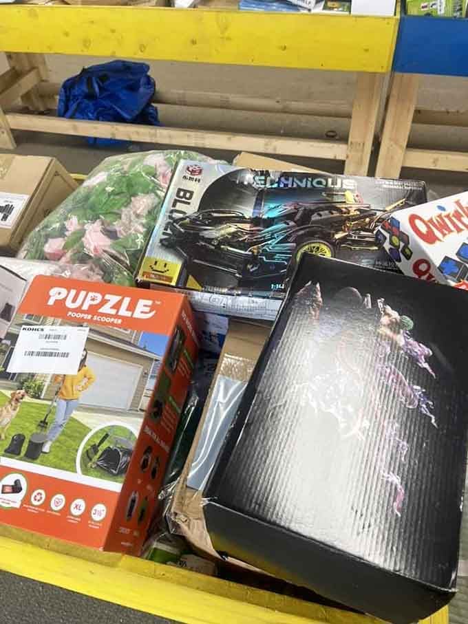 From remote-controlled cars to puzzles, this table holds more childhood joy than a Saturday morning cartoon lineup.