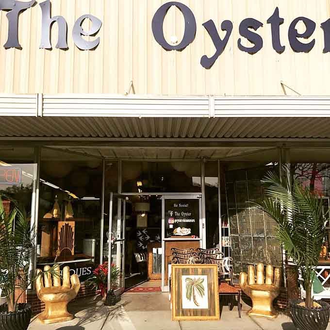 The Oyster isn't serving seafood—it's dishing up vintage treasures where those wooden hand sculptures are practically begging for a high-five.