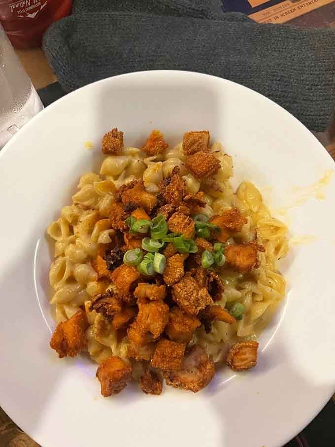 Buffalo Buff Mac combines creamy pasta with crispy buffalo chicken, creating the ultimate comfort food mashup you didn't know you needed.