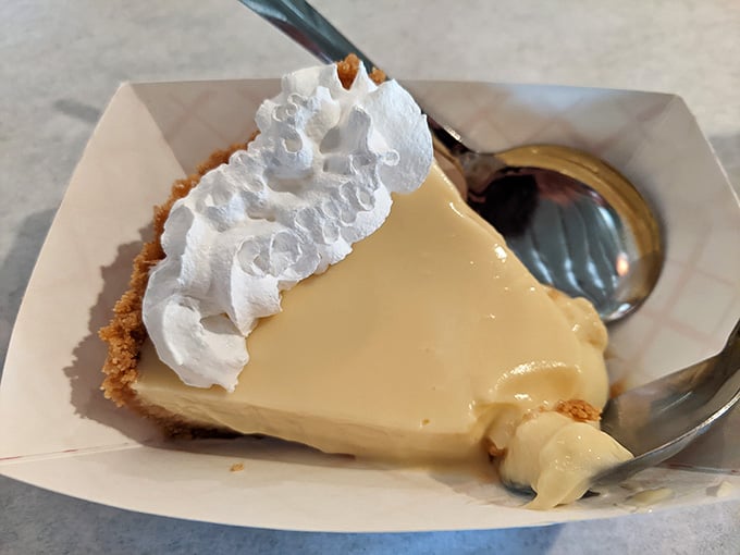 Key lime pie with a cloud of whipped cream—tart, sweet, and exactly what your taste buds have been dreaming about.