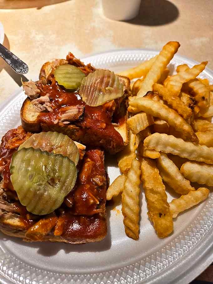 Texas toast loaded with smoky pulled pork and pickles delivers barbecue sandwich excellence in every messy, delicious bite.