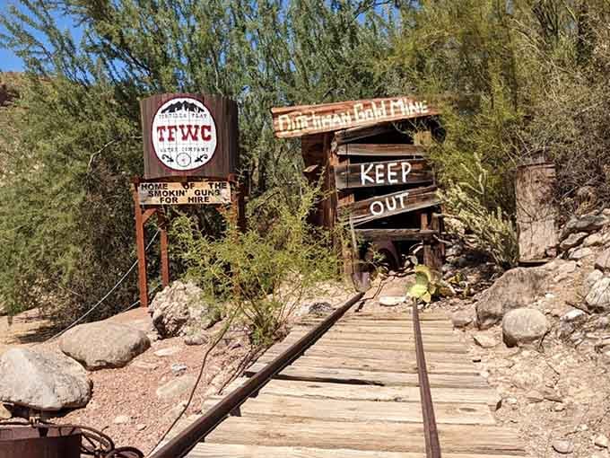 The "Keep Out" signs add frontier charm to this wooden walkway leading somewhere mysterious and wonderfully off-limits to tourists.