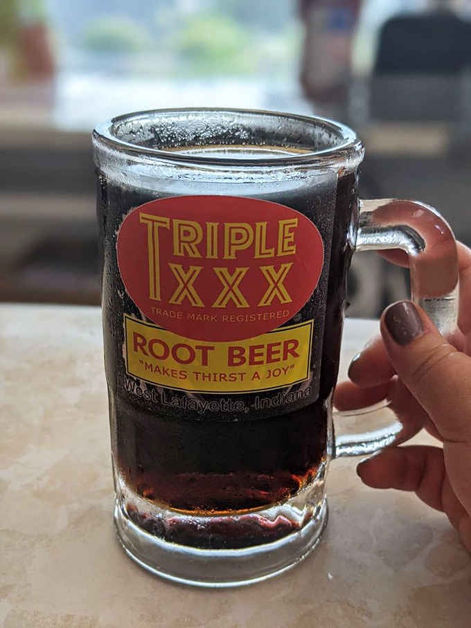 That frosted mug of house-made root beer makes every sip feel like a special occasion worth celebrating properly.