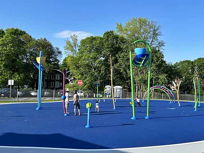 A splash pad featuring more water features than a Vegas casino fountain, minus the gambling and regret.