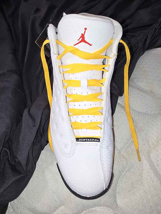 Air Jordans with yellow laces looking fresh enough to make sneakerheads weep tears of jealous joy and envy.