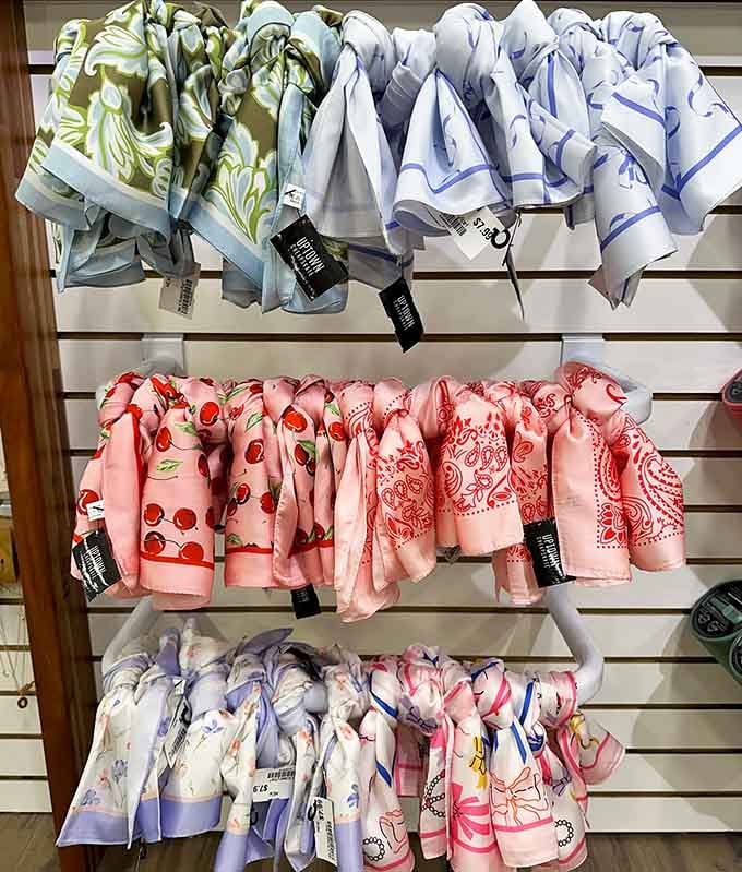 Scarves organized better than most people's lives, ready to add sophistication to any outfit without the boutique markup.