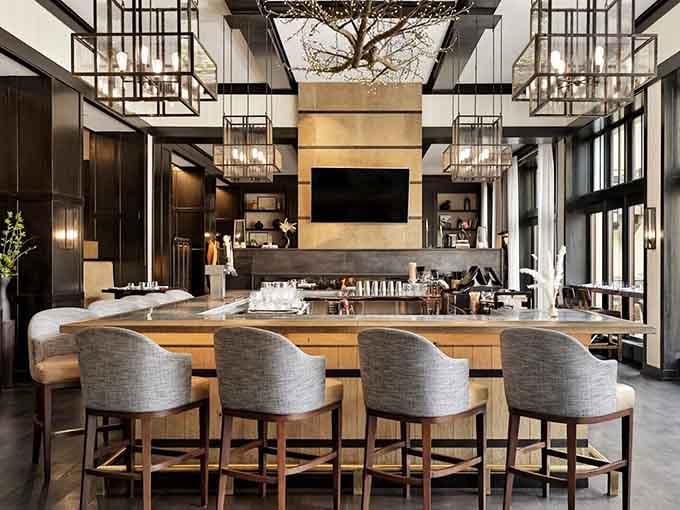 The Remedy's sleek interior at Four Seasons proves that mountain elegance doesn't require antlers on every available surface.