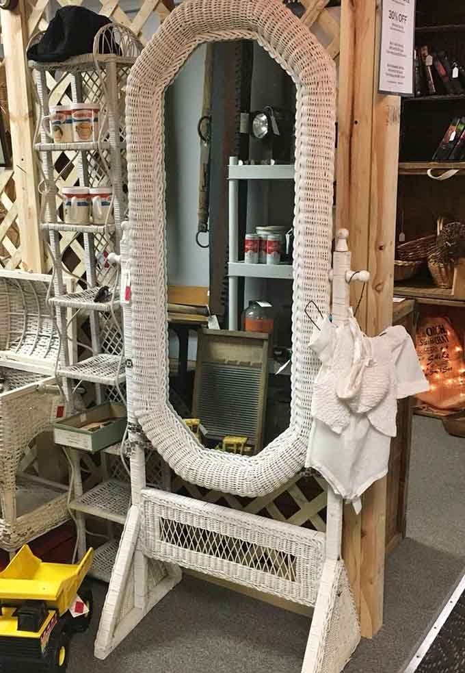 This wicker-framed mirror has reflected decades of fashion choices, probably some questionable ones, and it's still standing proud.