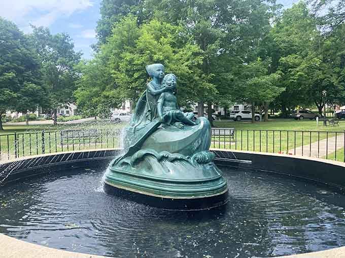 The Wynken, Blynken, and Nod fountain brings a touch of whimsy to The Green's peaceful landscape.