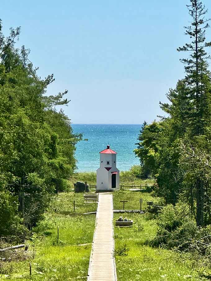 A charming lighthouse marks your path to the beach, because even Wisconsin does nautical with style.
