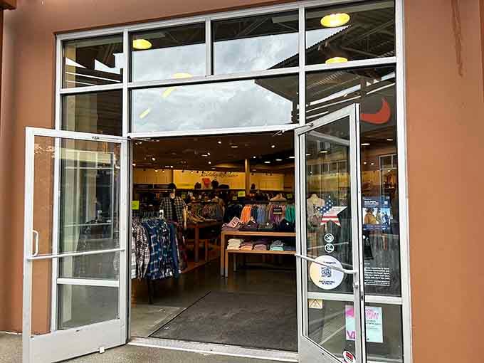 A shopper's paradise of backpacks and footwear, where the 50% off sign is the most beautiful decoration of all.