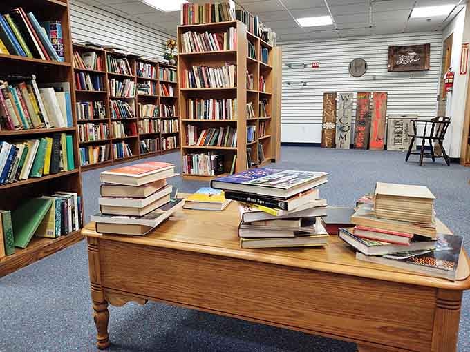 Literary treasures stacked high on weathered oak&mdash;where else can you find first editions and forgotten bestsellers sharing the same table?