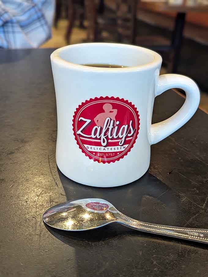 The coffee mug that launched a thousand conversations. In a world of paper cups and plastic lids, Zaftigs reminds us that proper deli coffee deserves proper ceramic respect.