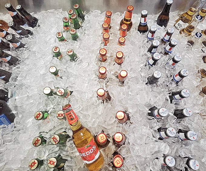 An ice bath of bottled possibilities. In the barbecue world, these cold soldiers stand ready to extinguish the delicious fires of spicy sauce.