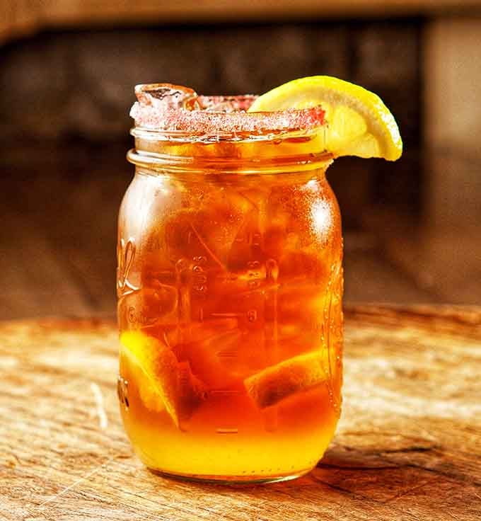 Sweet tea in a Mason jar &ndash; the unofficial state beverage of Alabama, delivering sunshine in liquid form with every sip.