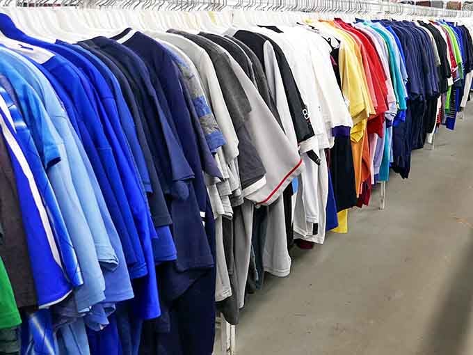 The men's shirt section, organized by color like a rainbow of cotton possibilities. Even my fashion-challenged uncle could find something stylish here.