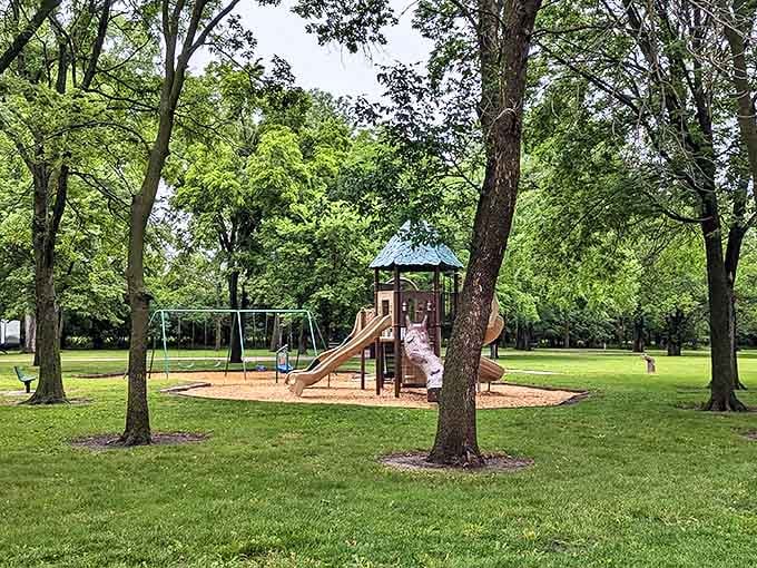 Kids' paradise found! This playground offers the perfect energy-burning station before parents attempt the mythical "peaceful evening by the campfire."