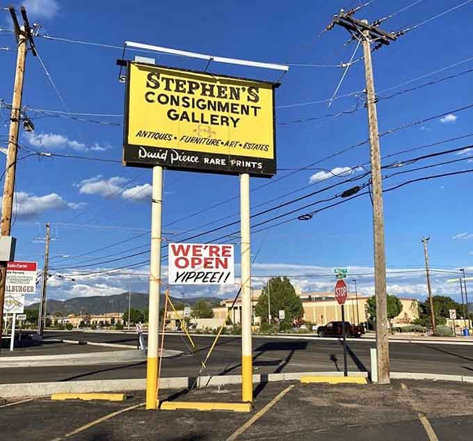 "WE'RE OPEN YIPPEE!!" declares the sign, with all the enthusiasm of someone who knows what treasures await inside.