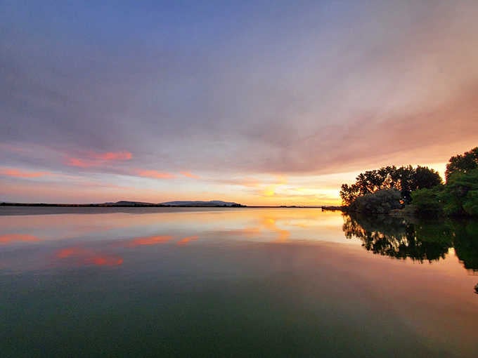 Sunset at Lake Walcott turns the water into liquid gold. No filter needed when nature's showing off like this.