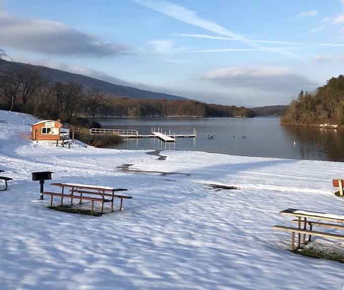 Winter's touch brings a magical transformation to Rocky Gap. The snow-dusted picnic tables wait patiently for summer's return.