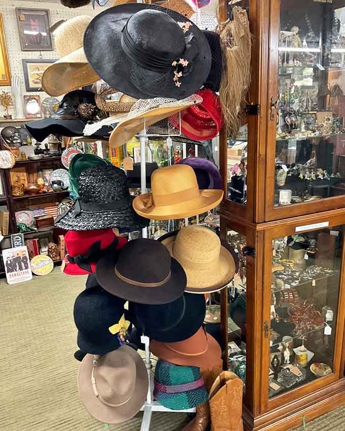 A tower of vintage hats ranging from practical to fabulous, each one ready to crown its next adventure.