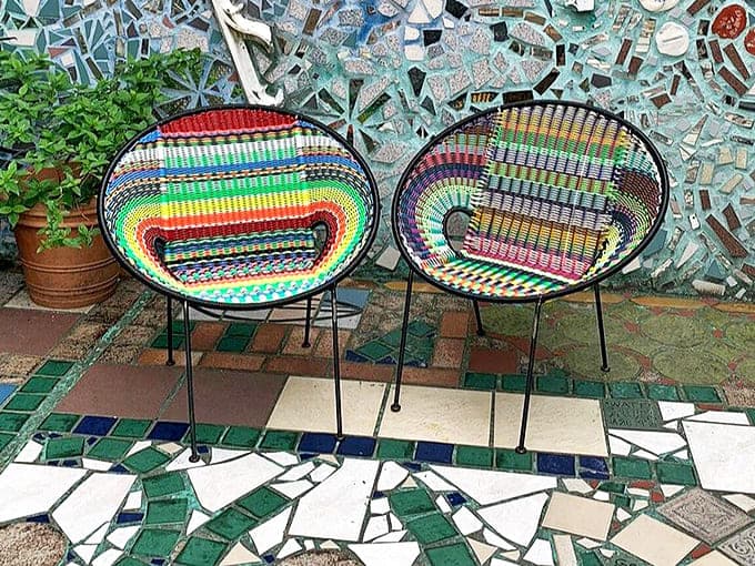 Take a load off, visually speaking. These woven chairs offer a moment of respite while perfectly complementing their mosaic backdrop.