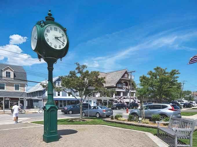 Bay Head's classic town clock in hunter green stands proud among shops where locals gather like characters in a beloved novel.