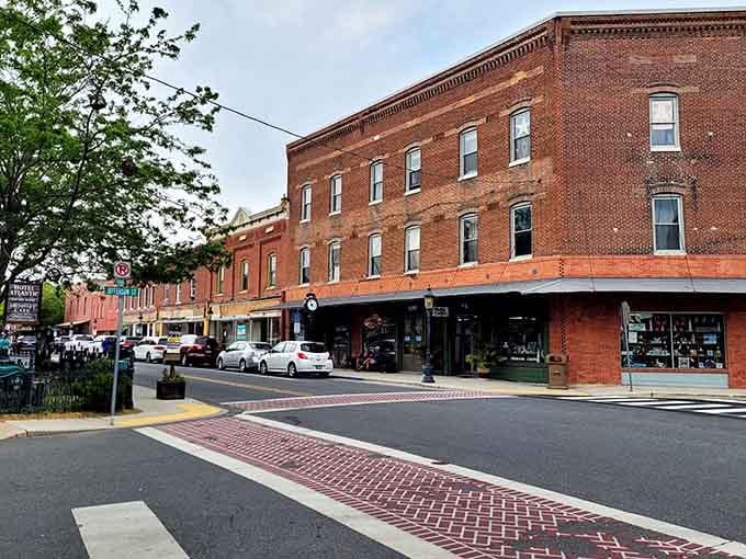 These storefronts have that warm brick glow that makes you want to park and explore every single shop.