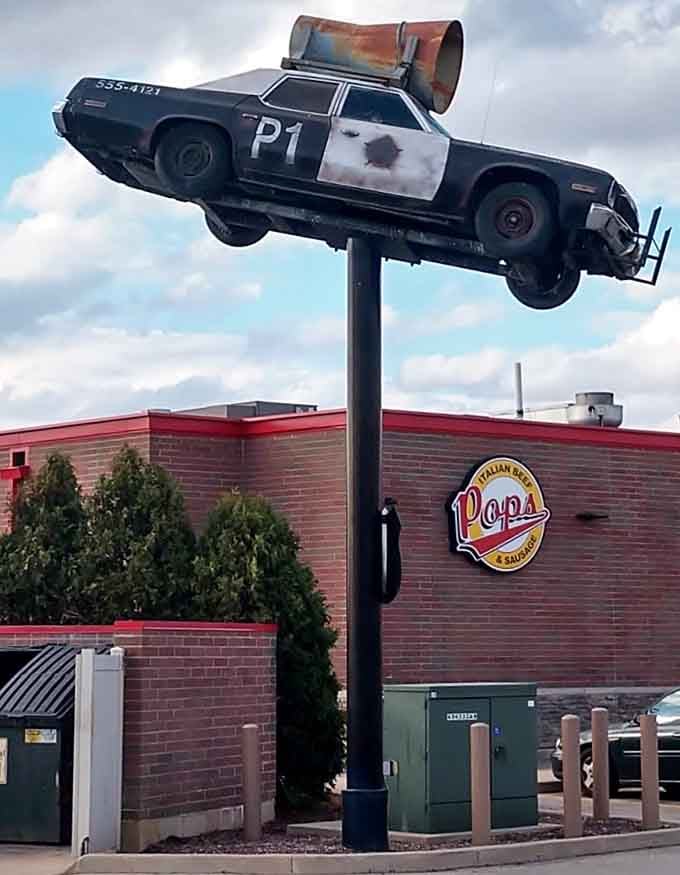 The Blues Brothers would be proud! This flying police car tribute captures the wild spirit of the iconic film's famous chase scenes.