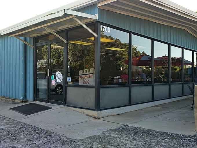 Bucky's unassuming blue building might not win architectural awards, but the smoke wafting from behind it deserves a blue ribbon.