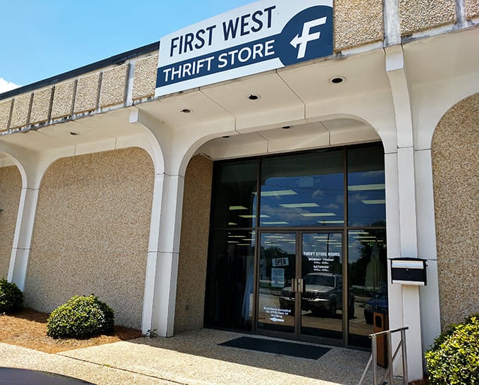 Architectural elegance meets bargain hunting! First West's distinctive arches welcome shoppers to a well-organized wonderland.