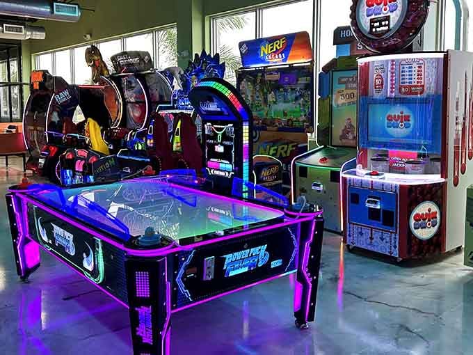 Arcade games glow with neon promise, their flashing lights calling to the kid in all of us.