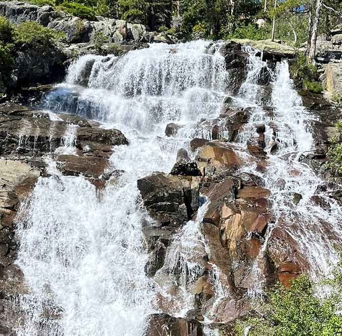 Mountain snowmelt charges down the granite slope with the energy of a kid racing downhill on the last day.