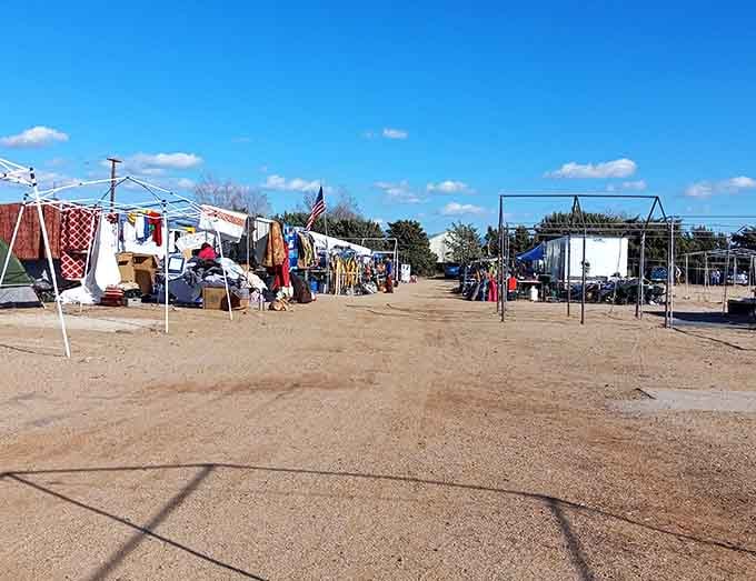 Open-air vendor spaces stretch toward distant mountains under skies that remind you why Arizona living rocks.