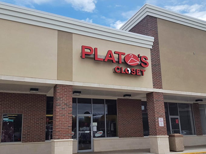 Brick columns frame the entrance to this modern thrift haven where trendy meets affordable in perfect harmony.