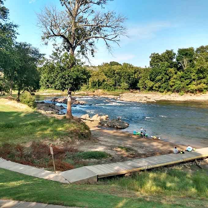 Shallow rapids invite families to wade and play where the river becomes everyone's backyard swimming hole.