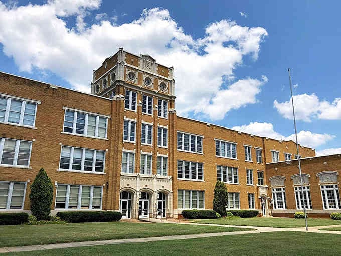 Gothic revival architecture reaches skyward like prayers carved in golden brick and stone.