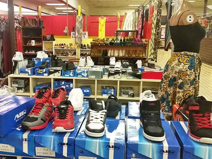 Athletic shoes displayed on bright blue boxes line up like soldiers ready to march straight into your shopping cart.