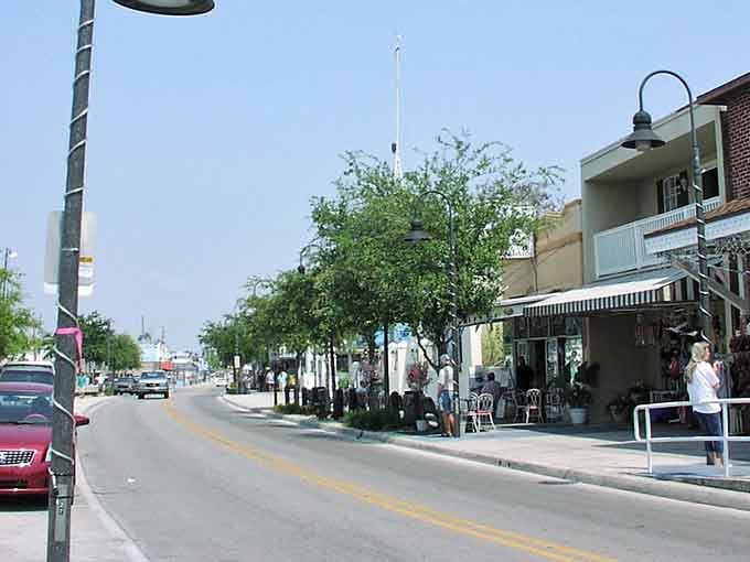 Live oaks shade a main street where the Palace Saloon has been serving cold ones since Teddy Roosevelt was president.