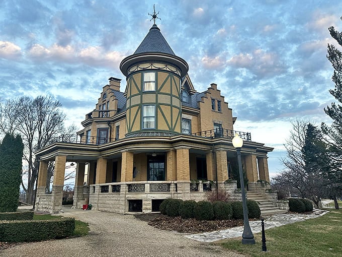 The Castle's yellow facade and unique step-gabled roof create a royal European presence in the heart of Lexington.