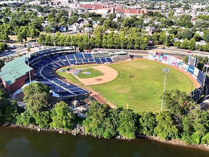 Classic ballpark nestled in greenery proves America's pastime doesn't need fancy stadiums to capture hearts and summer memories.