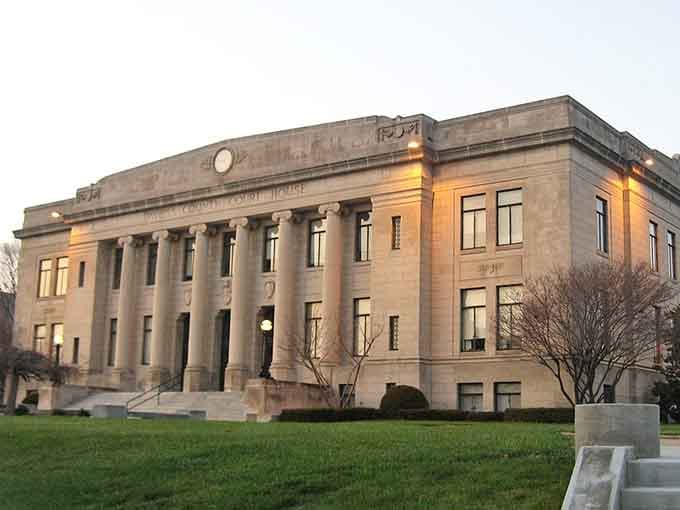 Golden evening light bathes the classical columns, making even government buildings look warm and almost welcoming.