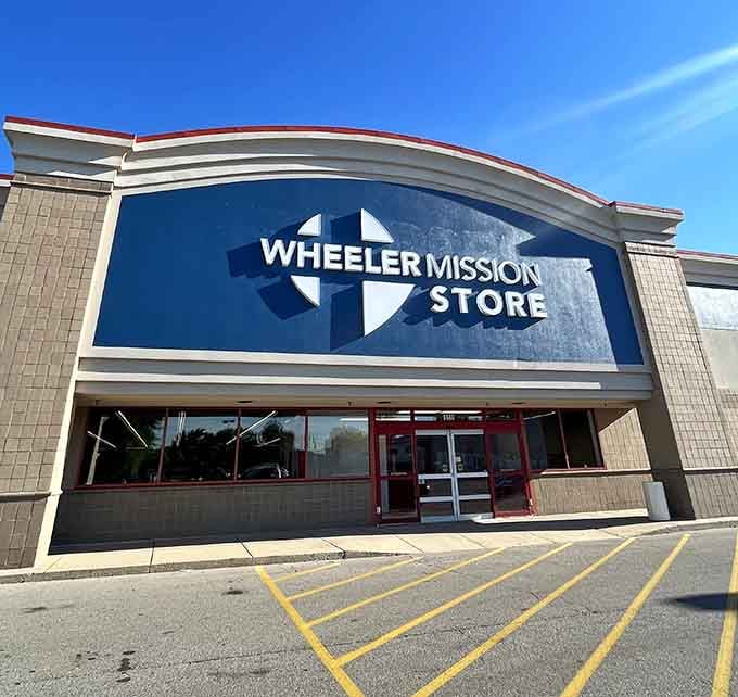 Wheeler Mission's bold blue signage and curved roofline create an inviting presence that's hard to miss from the road.