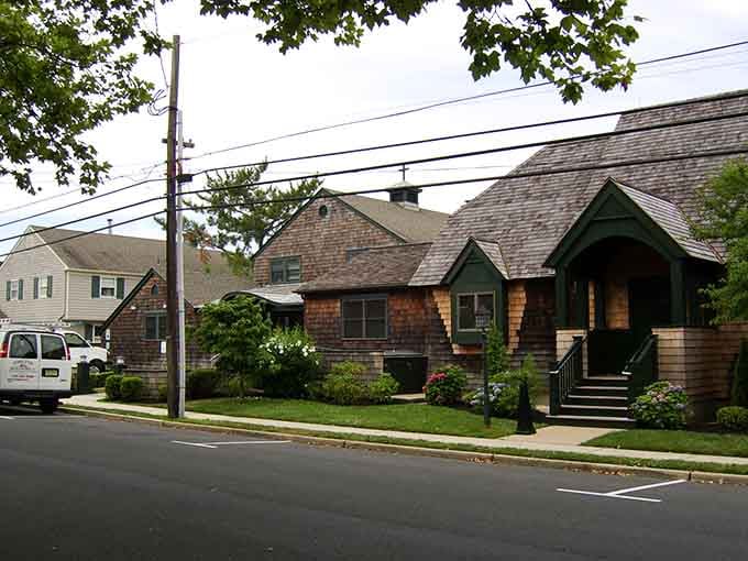 Charming shingled cottages line these quiet streets where the ocean breeze carries the scent of salt and summer memories.