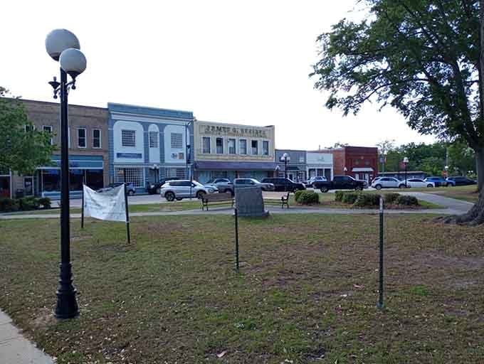 The town square with its monument and green space remains the heart where community still actually means something real.